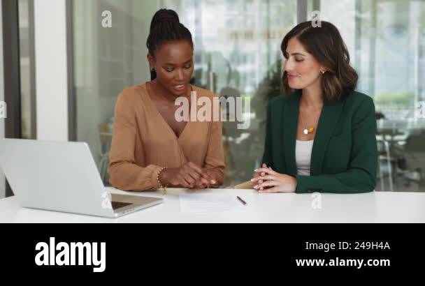 Female client signs contract paper at formal and collaborative meeting ...