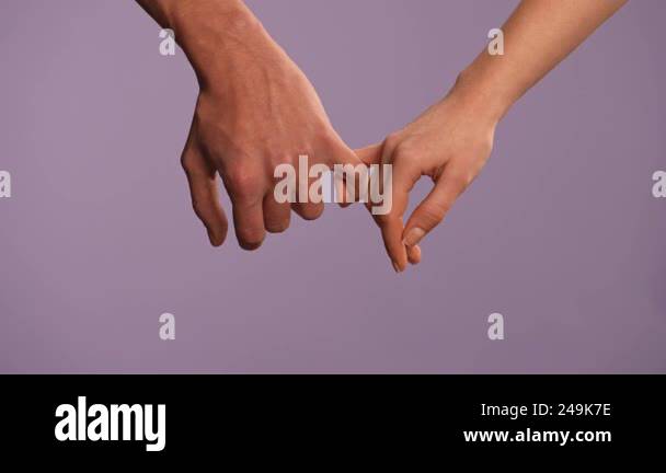Hand gestures and signs. Man and woman holding hands, touching with ...