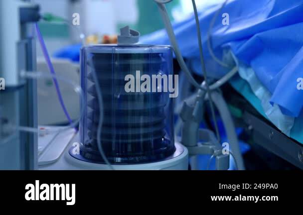 Artificial lung ventilating machine pump goes slowly up and down ...