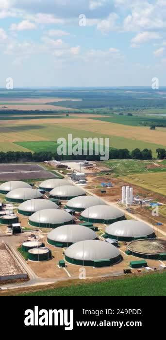 Production of biogas. New plant constructed on fields. Renewable energy ...