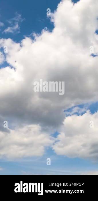 White cloudscape formation in the atmosphere. Summer sky with changing ...