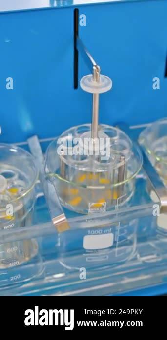Experiments at the lab. Sliding shot of a dissolution apparatus testing ...