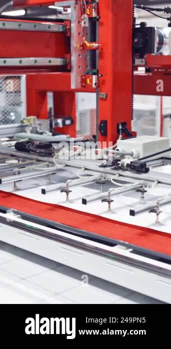 Contemporary equipment inside the factory. Close-up work of automated ...