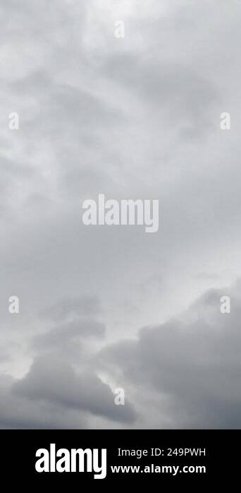 Grey gloomy sky at daytime on bad weather. Rainy clouds covering the ...