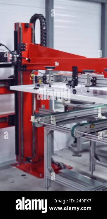 Contemporary industrial plant indoors. Automated equipment inside the ...