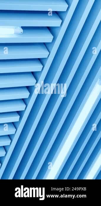 Decorative panels on the ceiling with long led lamps. Switched on ...