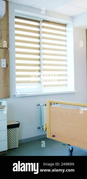 Big light comfortable ward in the maternity hospital. Pregnant lady ...