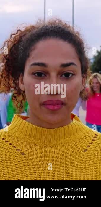 Vertical HD video of confident portrait of young beautiful African ...