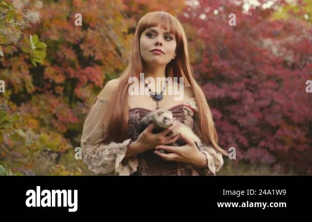 portrait beautiful redhead woman forest nymph with pet ferret on ...