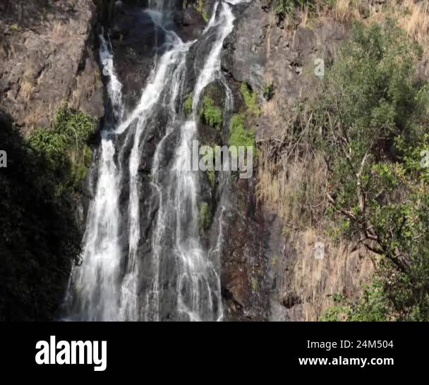Static video waterfall stream falling down rocks and stones of mountain ...