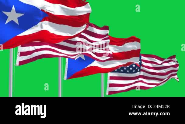 Flags of Puerto Rico waving with United States flags isolated on green ...