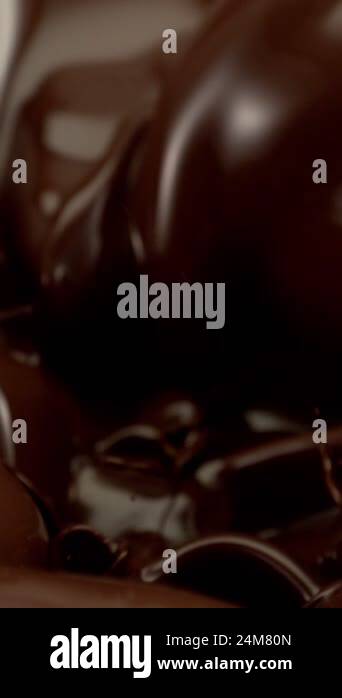 Super Slow Motion of Splashing and Mixing Hot Melted Chocolate ...