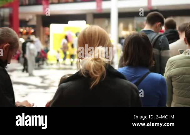 crowd waiting, Queue people, line indoor. Shopping mall, group of ...