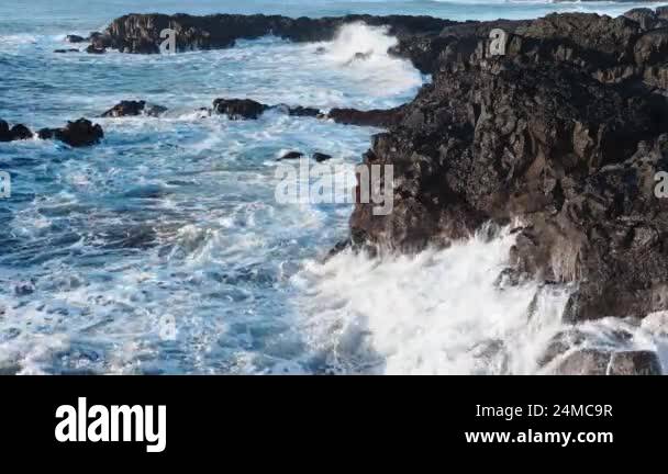 Extreme huge waves crash on the shore, Rocky ocean coast in Iceland ...