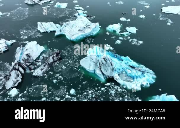 Iceberg in the ocean, Huge Chunks of Blue Glacier Ice floating on the ...