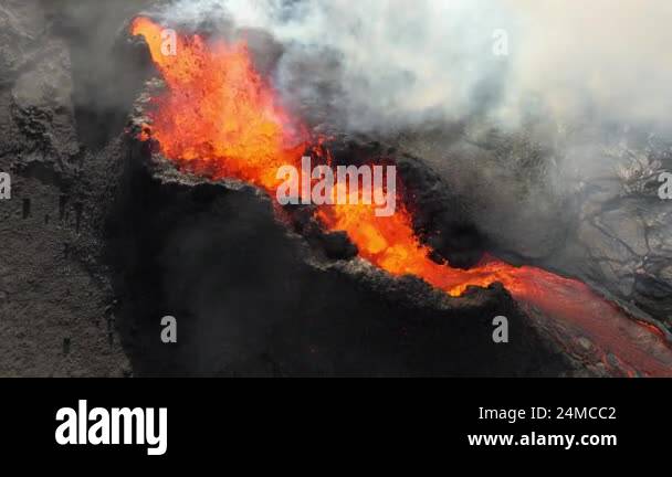 Volcano eruption, Red hot burning lava erupts from ground in Iceland ...