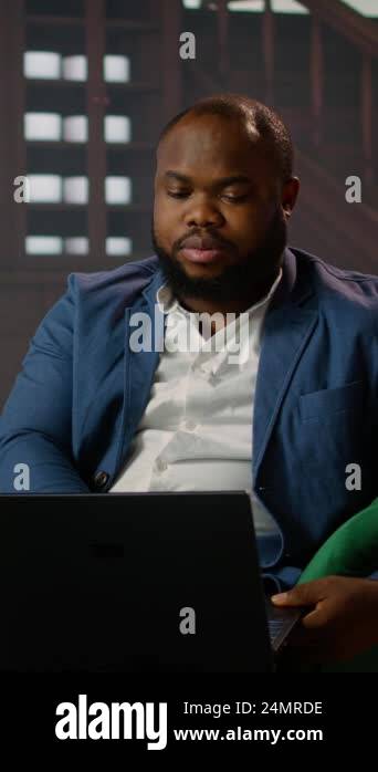 Vertical Video African american government spy monitoring satellite ...