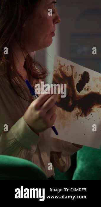 Vertical Video Military veteran studies Rorschach inkblot in therapy ...