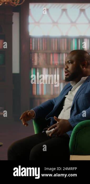 Vertical Video Two billionaires doing a handshake to start a new partnership together ...