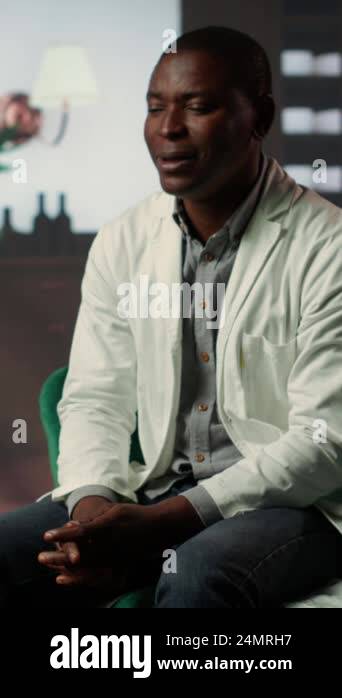 Vertical Video African American doctor discussing about PTSD after ...