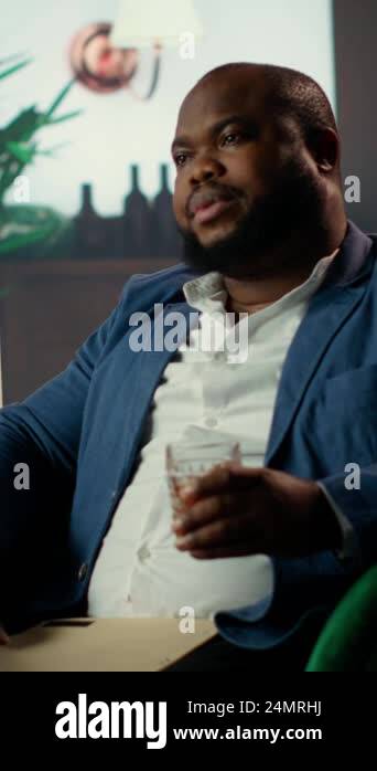 Vertical Video Diverse CIA officers meeting in a safe house library ...