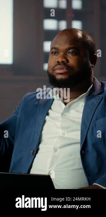 Vertical Video Black secret officer gathering intelligence for a secret ...