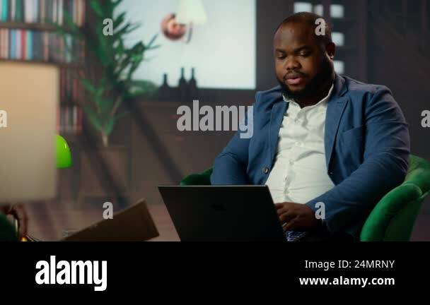 Diverse spies monitoring satellite surveillance data at headquarters ...