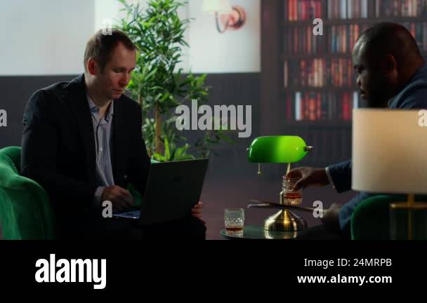 CIA agency manager presenting the satellite surveillance data on his pc ...