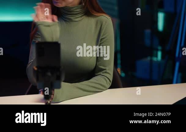 Joyous teenager filming content for online streaming channel in ...