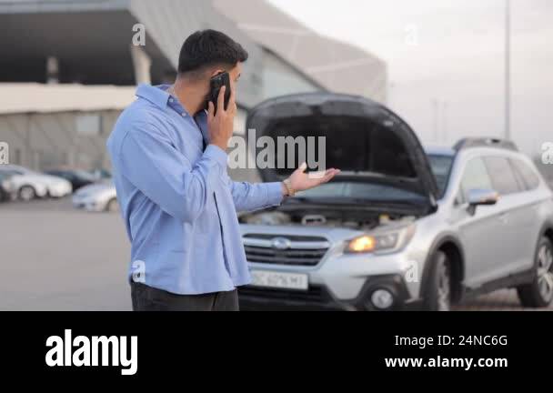 Furious Caucasian man wearing casual, calling service for help with ...