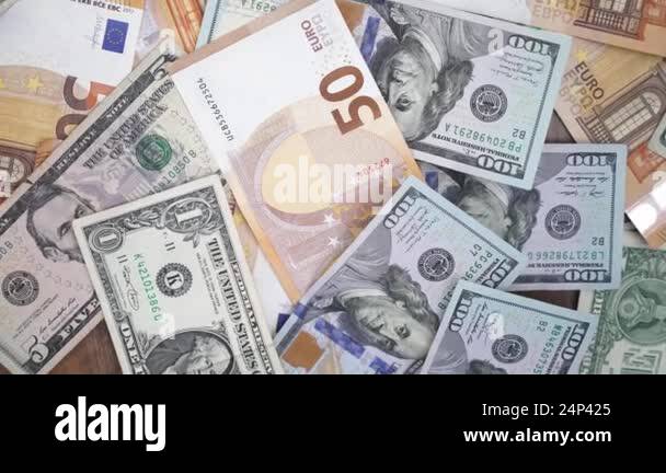 Table cluttered with euro and dollar notes captures essence of forex ...