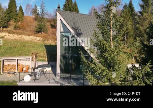 Aerial view Modern A-Frame Cabin with Deck and Hot Tub. Close-up of a ...