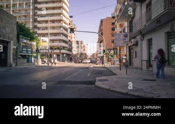 Palermo, Italy 1 January 2025: Scooter crossing busy intersection in ...
