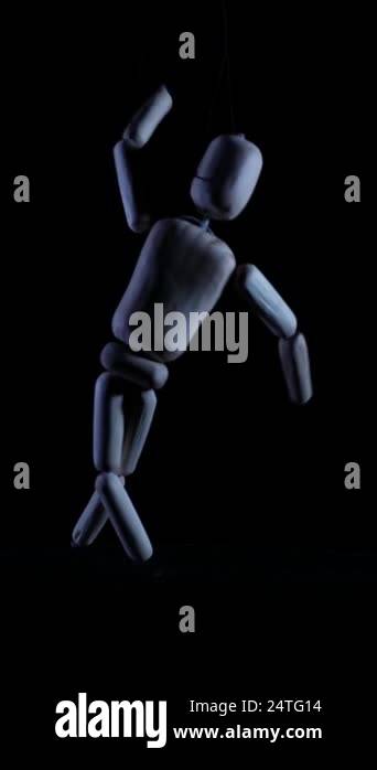 Vertical, Wooden mannequin suspended in darkness. Spooky wooden figure ...