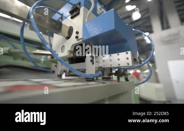 Mechanism moves finished paper web along production line. Equipment ...