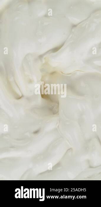 Super Slow Motion of Whirling Milky Cream . Filmed on High Speed Cinema ...