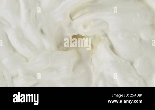 Super Slow Motion of Whirling Milky Cream . Filmed on High Speed Cinema ...