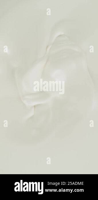 Super Slow Motion of Whirling Milky Cream . Filmed on High Speed Cinema ...