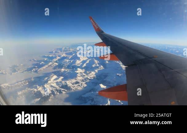 Milan, Italy - December 12, 2024 - high-altitude window view of Easyjet ...
