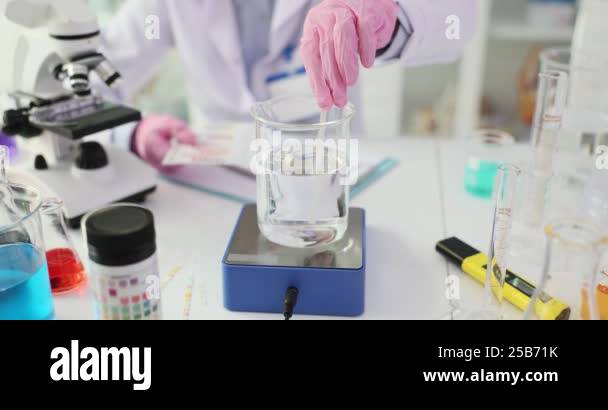 Solution chemistry beaker sample Stock Videos & Footage - HD and 4K ...