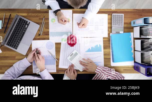 Professionals and diverse teams actively engaged in data analysis and ...