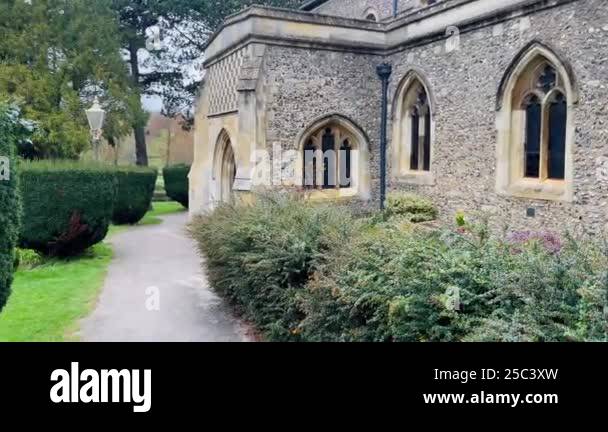 Charming stone church with pointed arch windows and intricate detailing ...