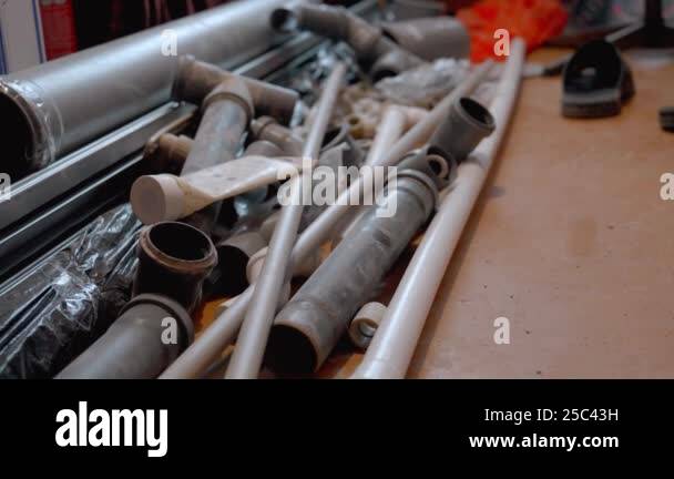 PVC pipes and fittings for assembling plumbing system in house under ...