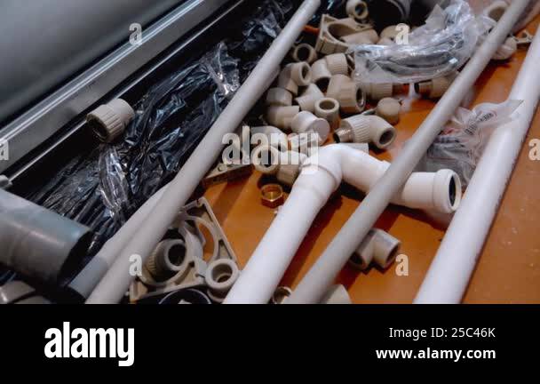 PVC pipes and fittings in preparation for plumbing installation or ...