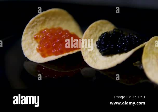 Beluga sturgeon salted roe in glass bowl. Raw seafood. Luxury delicacy ...