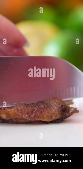 goose duck with apples Chef slicing freshly grilled juicy beef steak ...