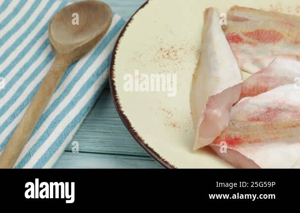 red mullet fish fillet, close-up, on a plate Stock Video Footage - Alamy