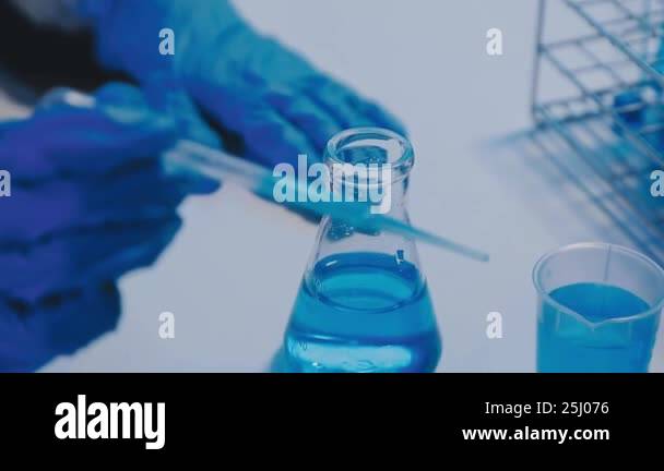 close - up of blue liquid in laboratory Stock Video Footage - Alamy