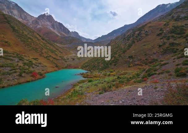 The mountains are reflected in the mirrored surface of the lake Lower ...