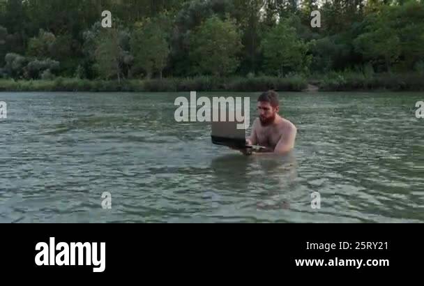 Canoe man laptop Stock Videos & Footage - HD and 4K Video Clips - Alamy